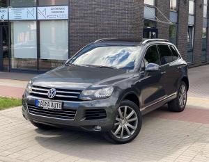 Grey Volkswagen Touareg 2012 in Marijampole, with an engine capacity of 2.97 L and mileage of 286 thousand km for 13550 €, photo  on AUTOMOTO.COM.LV