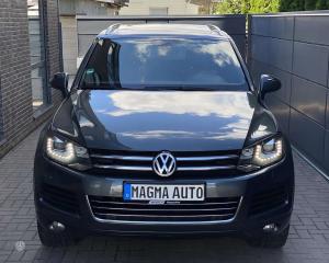 Grey Volkswagen Touareg 2012 in Marijampole, with an engine capacity of 2.97 L and mileage of 286 thousand km for 13550 €, photo 4 on AUTOMOTO.COM.LV
