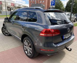 Grey Volkswagen Touareg 2012 in Marijampole, with an engine capacity of 2.97 L and mileage of 286 thousand km for 13550 €, photo 13 on AUTOMOTO.COM.LV