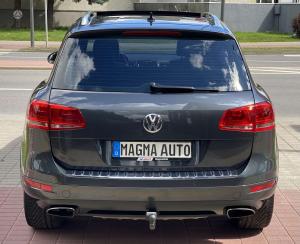 Grey Volkswagen Touareg 2012 in Marijampole, with an engine capacity of 2.97 L and mileage of 286 thousand km for 13550 €, photo 17 on AUTOMOTO.COM.LV