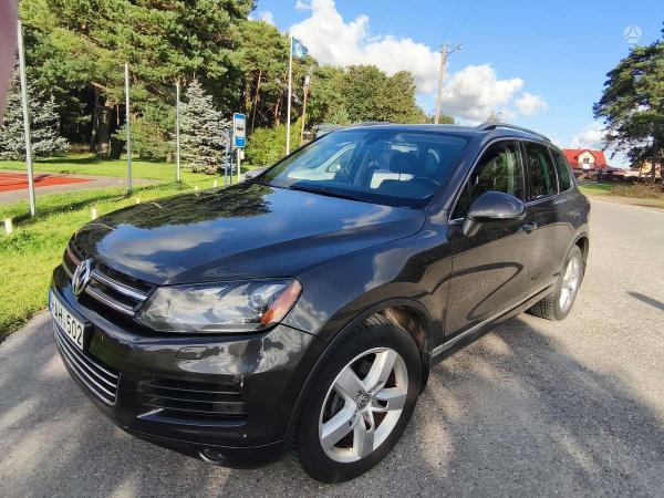 Grey Volkswagen Touareg 2012 in Klaipeda, with an engine capacity of 2.97 L and mileage of 227 thousand km for 9500 €, photo 4 on AUTOMOTO.COM.LV