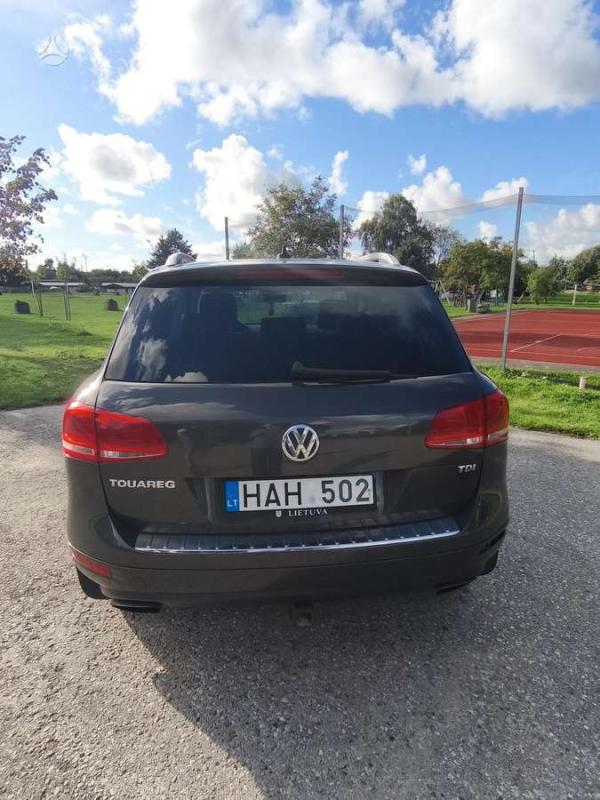 Grey Volkswagen Touareg 2012 in Klaipeda, with an engine capacity of 2.97 L and mileage of 227 thousand km for 9500 €, photo 6 on AUTOMOTO.COM.LV