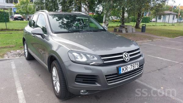 Pelēks Volkswagen Touareg 2013 Rīga, ar dzinēja tilpumu 3.00 L un nobraukumu 300 tūkst. km par 7700 €, foto 1 vietnē AUTOMOTO.COM.LV