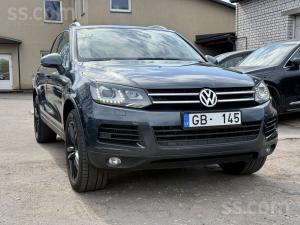 Pelēks Volkswagen Touareg 2013 Rīga, ar dzinēja tilpumu 3.00 L un nobraukumu 0 tūkst. km par 10600 €, foto  vietnē AUTOMOTO.COM.LV