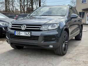 Pelēks Volkswagen Touareg 2013 Rīga, ar dzinēja tilpumu 3.00 L un nobraukumu 0 tūkst. km par 10600 €, foto 3 vietnē AUTOMOTO.COM.LV