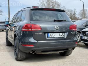 Pelēks Volkswagen Touareg 2013 Rīga, ar dzinēja tilpumu 3.00 L un nobraukumu 0 tūkst. km par 10600 €, foto 4 vietnē AUTOMOTO.COM.LV