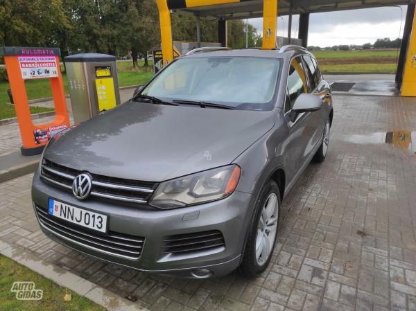 Volkswagen Touareg 2013 in Sirvintos on AUTOMOTO.COM.LV Grey Volkswagen Touareg 2013 in Sirvintos, with an engine capacity of 3.00 L and mileage of 290 thousand km for 10800 €, photo 1 on AUTOMOTO.COM.LV
