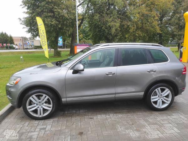 Volkswagen Touareg 2013 in Sirvintos on AUTOMOTO.COM.LV Grey Volkswagen Touareg 2013 in Sirvintos, with an engine capacity of 3.00 L and mileage of 290 thousand km for 10800 €, photo 3 on AUTOMOTO.COM.LV