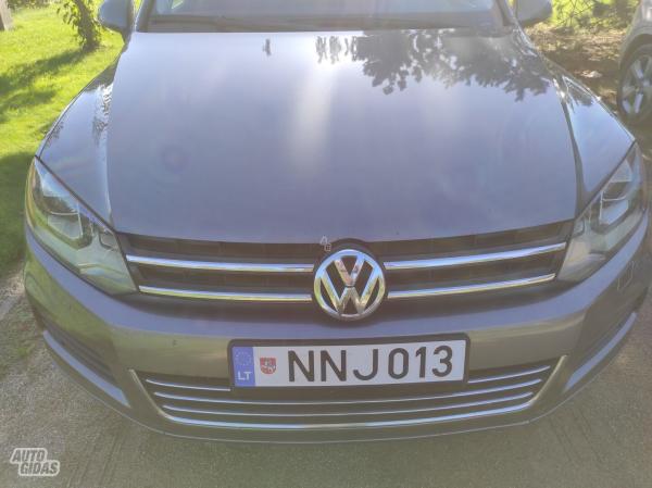 Volkswagen Touareg 2013 in Sirvintos on AUTOMOTO.COM.LV Grey Volkswagen Touareg 2013 in Sirvintos, with an engine capacity of 3.00 L and mileage of 290 thousand km for 10800 €, photo 7 on AUTOMOTO.COM.LV