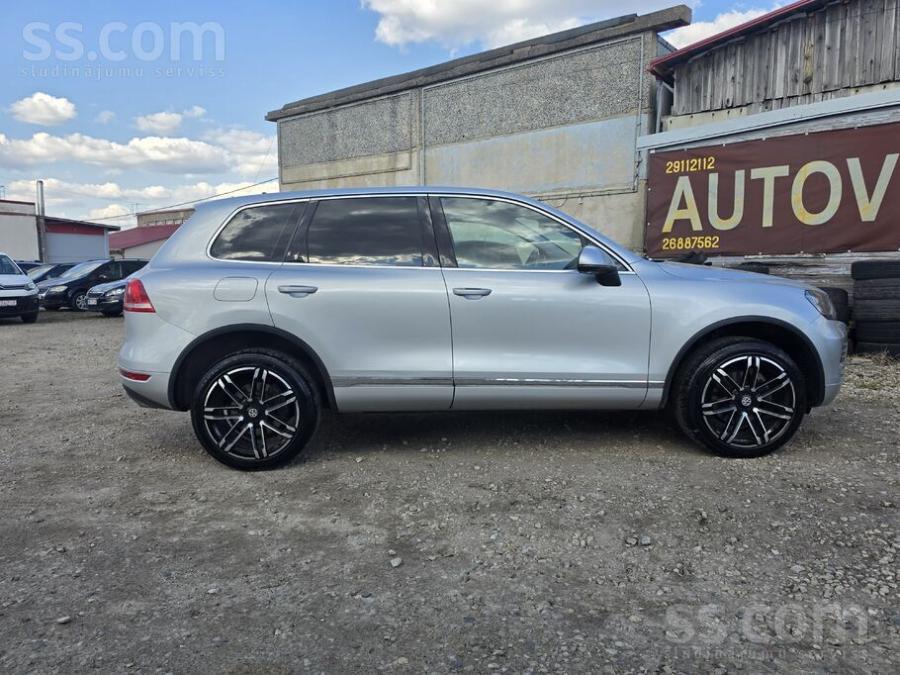 Grey Volkswagen Touareg 2014 in Rezekne, with an engine capacity of 3.00 L and mileage of 0 thousand km for 10850 €, photo 1 on AUTOMOTO.COM.LV