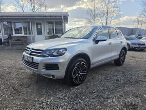Grey Volkswagen Touareg 2014 in Rezekne, with an engine capacity of 3.00 L and mileage of 0 thousand km for 10850 €, photo 3 on AUTOMOTO.COM.LV
