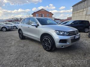 Grey Volkswagen Touareg 2014 in Rezekne, with an engine capacity of 3.00 L and mileage of 0 thousand km for 10850 €, photo 4 on AUTOMOTO.COM.LV