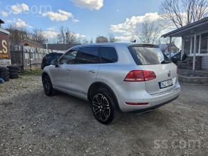 Grey Volkswagen Touareg 2014 in Rezekne, with an engine capacity of 3.00 L and mileage of 0 thousand km for 10850 €, photo 5 on AUTOMOTO.COM.LV