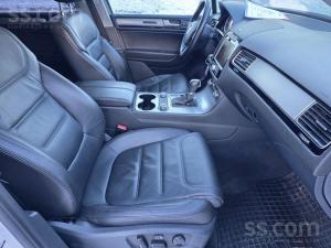 Grey Volkswagen Touareg 2014 in Rezekne, with an engine capacity of 3.00 L and mileage of 0 thousand km for 10850 €, photo 11 on AUTOMOTO.COM.LV
