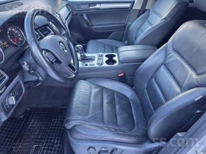 Grey Volkswagen Touareg 2014 in Rezekne, with an engine capacity of 3.00 L and mileage of 0 thousand km for 10850 €, photo 12 on AUTOMOTO.COM.LV