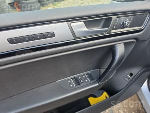 Grey Volkswagen Touareg 2014 in Rezekne, with an engine capacity of 3.00 L and mileage of 0 thousand km for 10850 €, photo 19 on AUTOMOTO.COM.LV