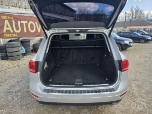 Grey Volkswagen Touareg 2014 in Rezekne, with an engine capacity of 3.00 L and mileage of 0 thousand km for 10850 €, photo 22 on AUTOMOTO.COM.LV