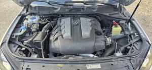 Grey Volkswagen Touareg 2014 in Rezekne, with an engine capacity of 3.00 L and mileage of 0 thousand km for 10850 €, photo 32 on AUTOMOTO.COM.LV