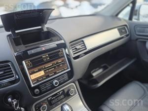 Grey Volkswagen Touareg 2014 in Rezekne, with an engine capacity of 3.00 L and mileage of 0 thousand km for 10850 €, photo 34 on AUTOMOTO.COM.LV