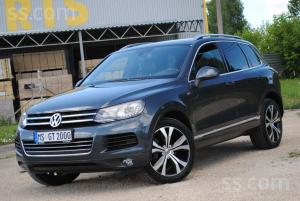 Grey Volkswagen Touareg 2014 in Riga, with an engine capacity of 3.00 L and mileage of 259 thousand km for 12990 €, photo  on AUTOMOTO.COM.LV