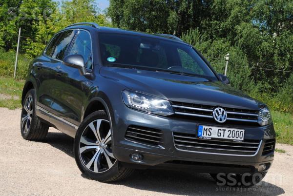 Grey Volkswagen Touareg 2014 in Riga, with an engine capacity of 3.00 L and mileage of 259 thousand km for 12990 €, photo 4 on AUTOMOTO.COM.LV