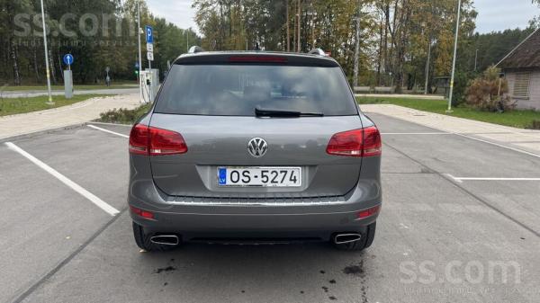 Volkswagen Touareg 2014 in Riga on AUTOMOTO.COM.LV Grey Volkswagen Touareg 2014 in Riga, with an engine capacity of 3.00 L and mileage of 236 thousand km for 13000 €, photo 5 on AUTOMOTO.COM.LV