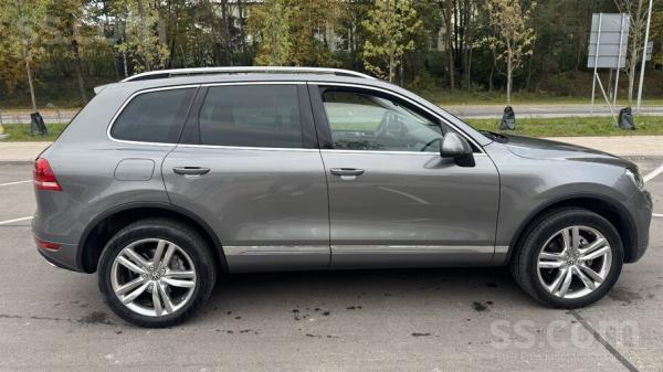 Volkswagen Touareg 2014 in Riga on AUTOMOTO.COM.LV Grey Volkswagen Touareg 2014 in Riga, with an engine capacity of 3.00 L and mileage of 236 thousand km for 13000 €, photo 7 on AUTOMOTO.COM.LV