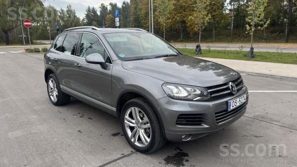 Volkswagen Touareg 2014 in Riga on AUTOMOTO.COM.LV Grey Volkswagen Touareg 2014 in Riga, with an engine capacity of 3.00 L and mileage of 236 thousand km for 13000 €, photo 8 on AUTOMOTO.COM.LV