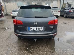 Grey Volkswagen Touareg 2015 in Riga, with an engine capacity of 3.00 L and mileage of 135 thousand km for 21000 €, photo 4 on AUTOMOTO.COM.LV