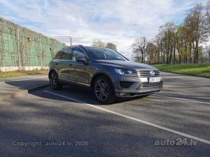 Grey Volkswagen Touareg 2015 in Tartu, with an engine capacity of 4.10 L and mileage of 194 thousand km for 20000 €, photo  on AUTOMOTO.COM.LV