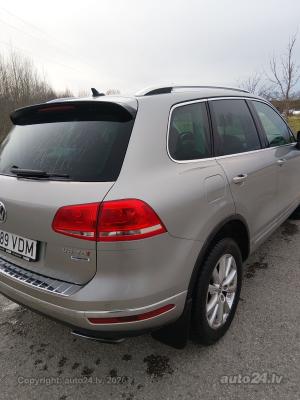 Grey Volkswagen Touareg 2015 in Tallinn, with an engine capacity of 3.00 L and mileage of 210 thousand km for 12345 €, photo 12 on AUTOMOTO.COM.LV