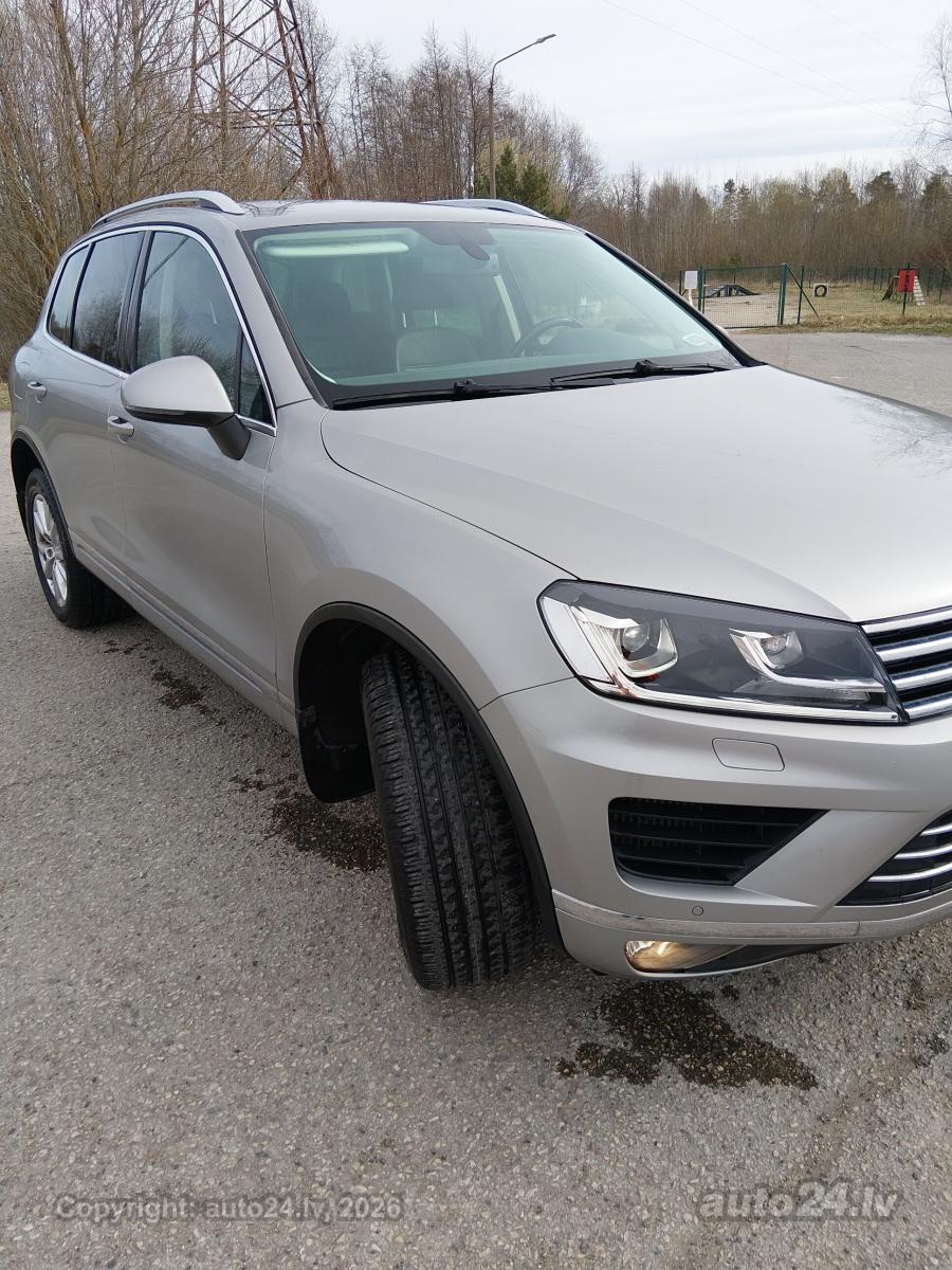 Grey Volkswagen Touareg 2015 in Tallinn, with an engine capacity of 3.00 L and mileage of 210 thousand km for 12345 €, photo 13 on AUTOMOTO.COM.LV
