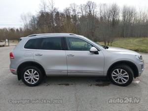 Grey Volkswagen Touareg 2015 in Tallinn, with an engine capacity of 3.00 L and mileage of 210 thousand km for 12345 €, photo 15 on AUTOMOTO.COM.LV