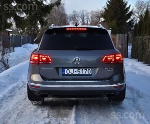 Grey Volkswagen Touareg 2015 in Jelgava, with an engine capacity of 3.00 L and mileage of 215 thousand km for 15490 €, photo 5 on AUTOMOTO.COM.LV