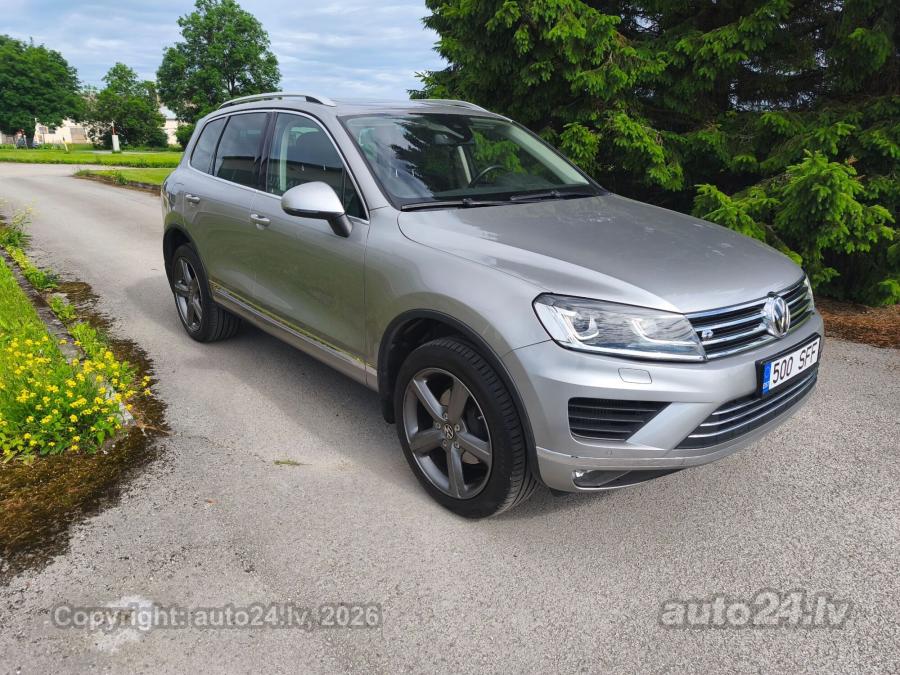 Grey Volkswagen Touareg 2015 in Tallinn, with an engine capacity of 3.00 L and mileage of 197 thousand km for 17800 €, photo 1 on AUTOMOTO.COM.LV