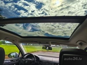 Grey Volkswagen Touareg 2015 in Tallinn, with an engine capacity of 3.00 L and mileage of 197 thousand km for 17800 €, photo 11 on AUTOMOTO.COM.LV