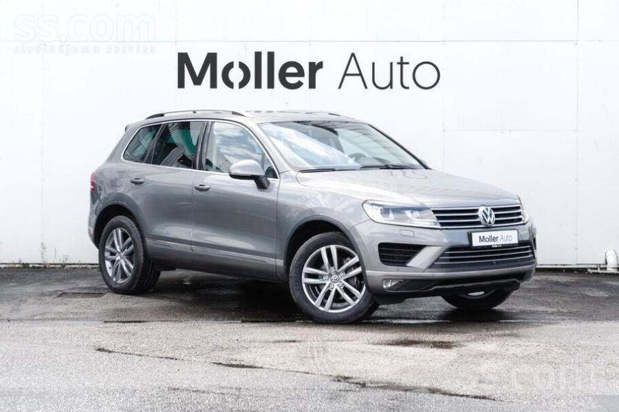 Grey Volkswagen Touareg 2015 in Riga, with an engine capacity of 3.00 L and mileage of 222 thousand km for 17950 €, photo 3 on AUTOMOTO.COM.LV