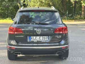 Grey Volkswagen Touareg 2015 in Riga, with an engine capacity of 3.00 L and mileage of 249 thousand km for 14390 €, photo 8 on AUTOMOTO.COM.LV