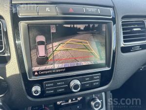 Grey Volkswagen Touareg 2015 in Riga, with an engine capacity of 3.00 L and mileage of 249 thousand km for 14390 €, photo 19 on AUTOMOTO.COM.LV
