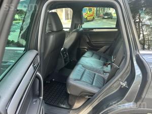 Grey Volkswagen Touareg 2015 in Riga, with an engine capacity of 3.00 L and mileage of 249 thousand km for 14390 €, photo 24 on AUTOMOTO.COM.LV