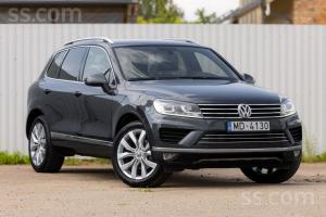 Grey Volkswagen Touareg 2016 in Jelgava, with an engine capacity of 3.00 L and mileage of 215 thousand km for 14200 €, photo  on AUTOMOTO.COM.LV