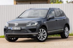 Grey Volkswagen Touareg 2016 in Jelgava, with an engine capacity of 3.00 L and mileage of 215 thousand km for 14200 €, photo 5 on AUTOMOTO.COM.LV