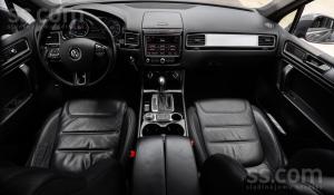 Grey Volkswagen Touareg 2016 in Jelgava, with an engine capacity of 3.00 L and mileage of 215 thousand km for 14200 €, photo 11 on AUTOMOTO.COM.LV