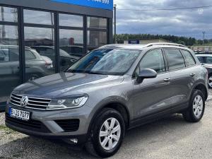 Grey Volkswagen Touareg 2017 in Vilnius, with an engine capacity of 3.00 L and mileage of 288 thousand km for 14950 €, photo  on AUTOMOTO.COM.LV