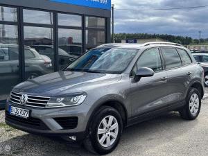 Grey Volkswagen Touareg 2017 in Vilnius, with an engine capacity of 3.00 L and mileage of 288 thousand km for 14750 €, photo  on AUTOMOTO.COM.LV