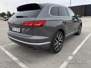 Grey Volkswagen Touareg 2021 in Tallinn, with an engine capacity of 3.00 L and mileage of 149 thousand km for 43500 €, photo 6 on AUTOMOTO.COM.LV