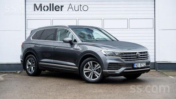 Grey Volkswagen Touareg 2023 in Riga, with an engine capacity of 3.00 L and mileage of 153 thousand km for 41350 €, photo 2 on AUTOMOTO.COM.LV
