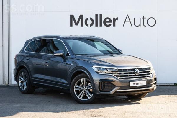 Pelēks Volkswagen Touareg 2023 Rīga, ar dzinēja tilpumu 3.00 L un nobraukumu 129 tūkst. km par 44900 €, foto 2 vietnē AUTOMOTO.COM.LV