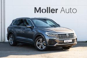 Grey Volkswagen Touareg 2023 in Riga, with an engine capacity of 3.00 L and mileage of 129 thousand km for 44900 €, photo 3 on AUTOMOTO.COM.LV