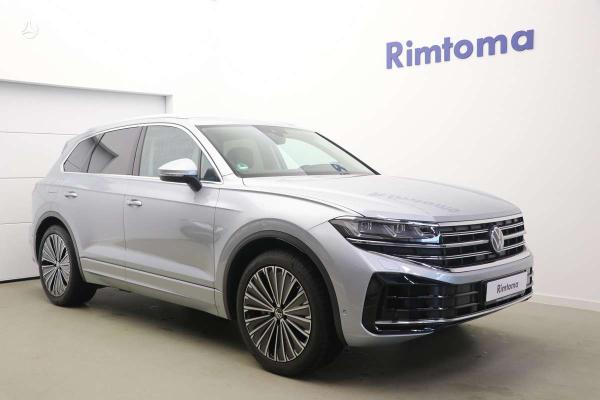 Grey Volkswagen Touareg 2024 in Vilnius, with an engine capacity of 3.00 L and mileage of 65 thousand km for 55490 €, photo 1 on AUTOMOTO.COM.LV